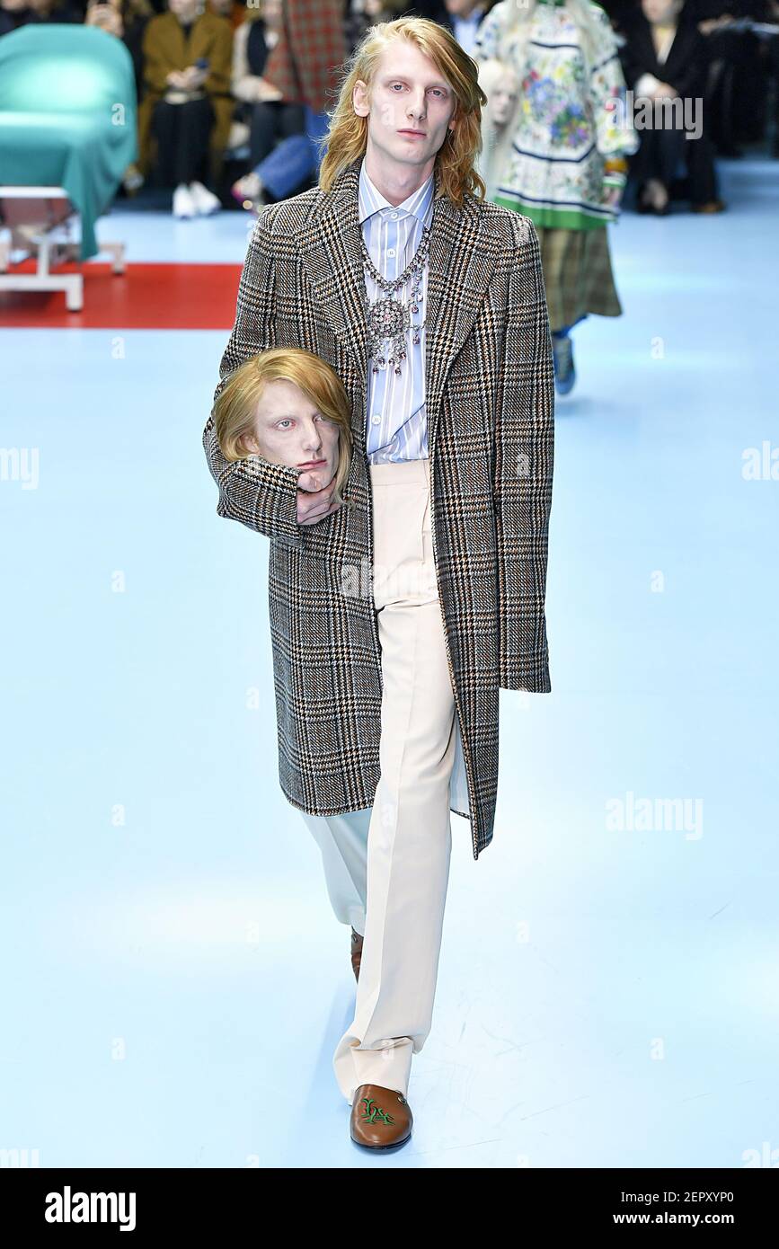 Model Dwight Hoogendijk walks on the runway during the Gucci Fashion ...