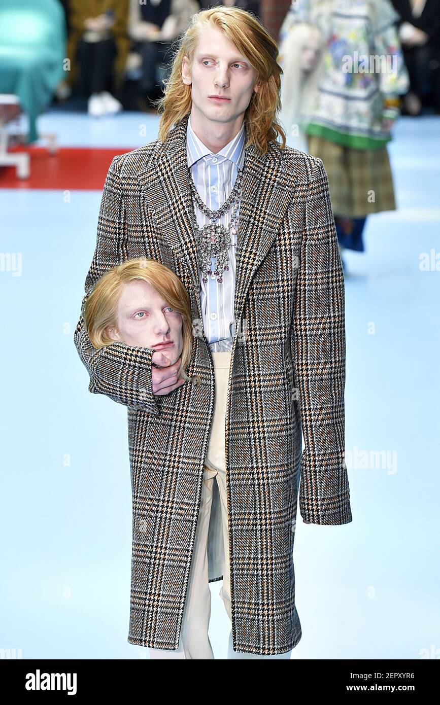 Model Dwight Hoogendijk walks on the runway during the Gucci Fashion ...