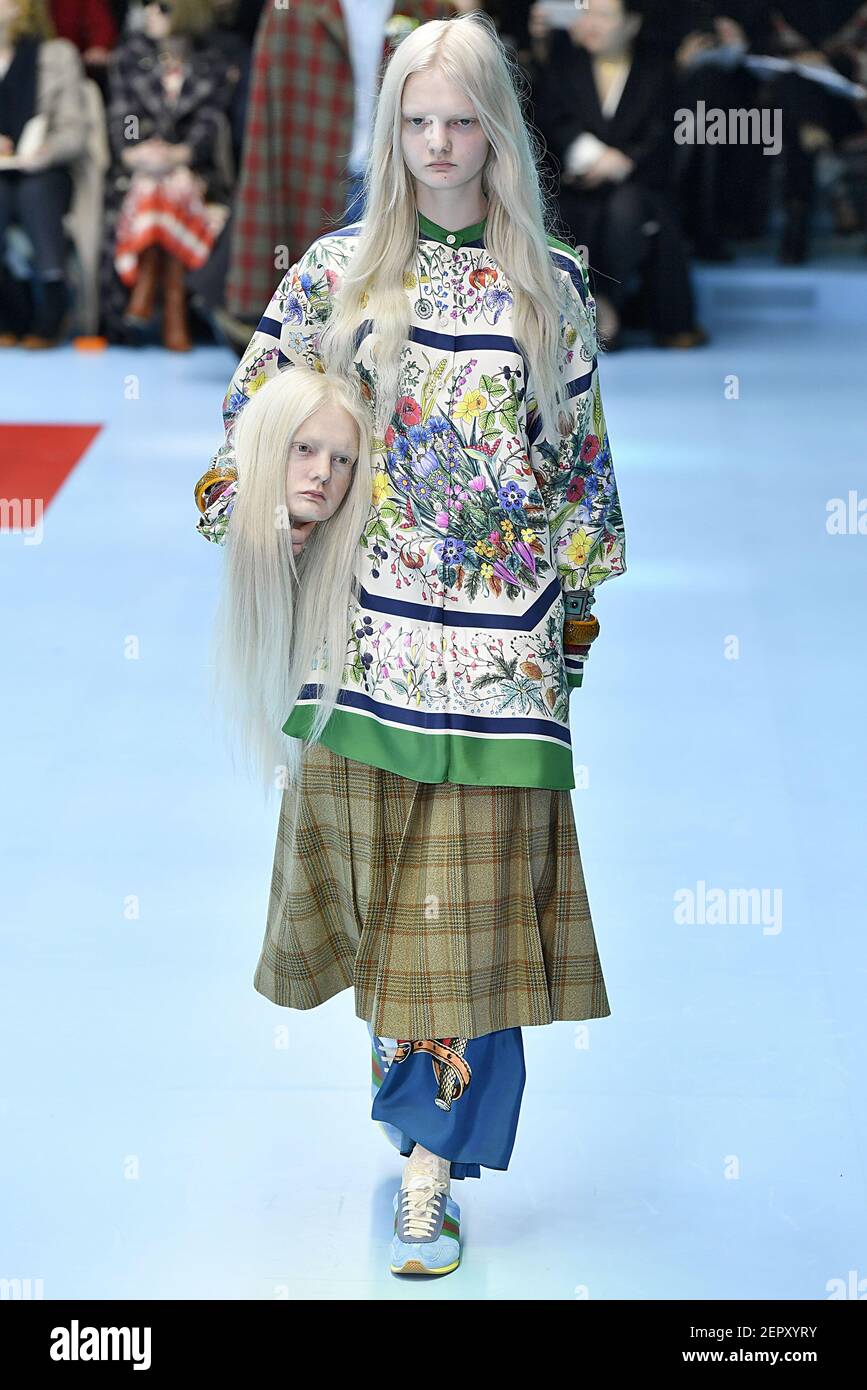 Model Unia Pakhomova walks on the runway during the Gucci Fashion Show ...