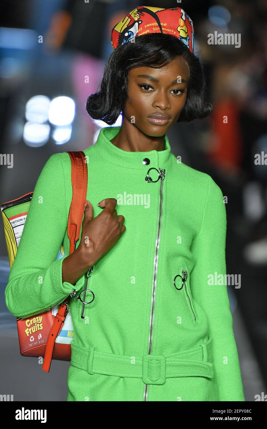 Model Mayowa Nicholas walks on the runway during the Moschino Fashion ...