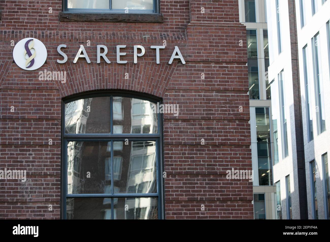 A logo sign outside of the headquarters of Sarepta Therapeutics, Inc ...