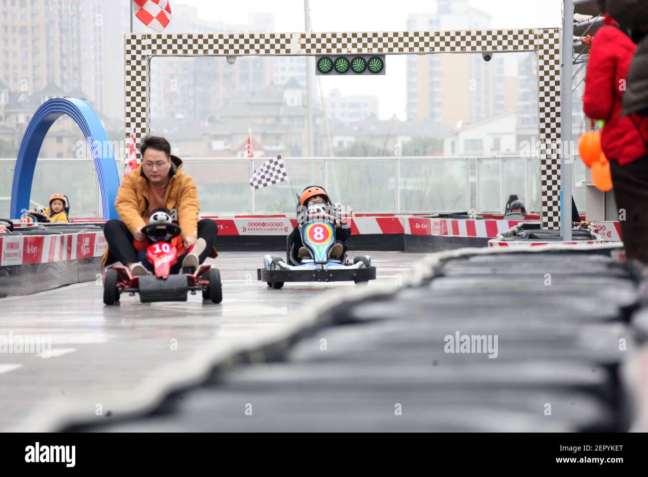 NANJING, CHINA - FEBRUARY 28, 2021 - Children drive a go kart on the ...