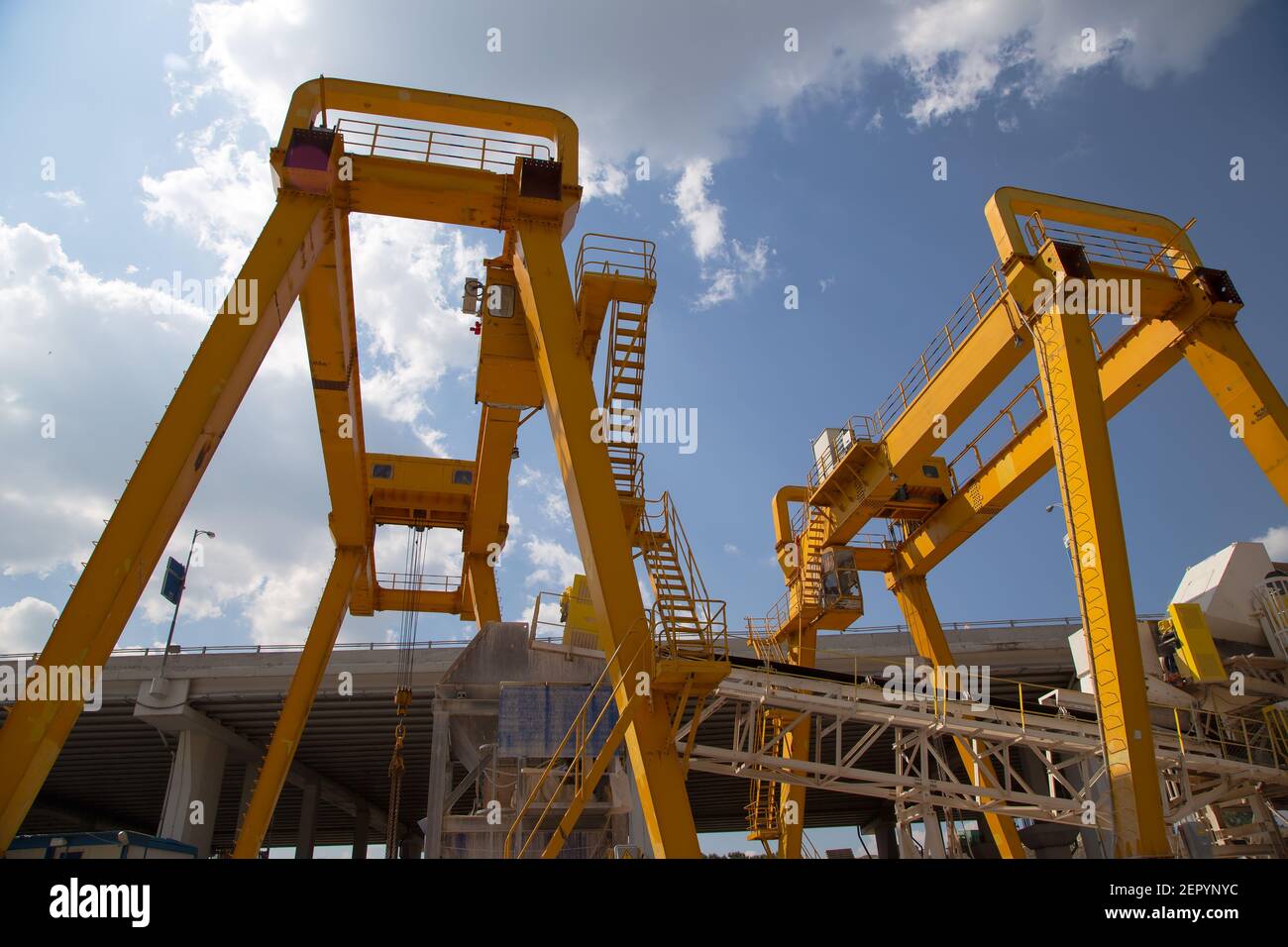 Yellow Gantry Bridge Crane for Cargo and Construction Stock Photo - Alamy