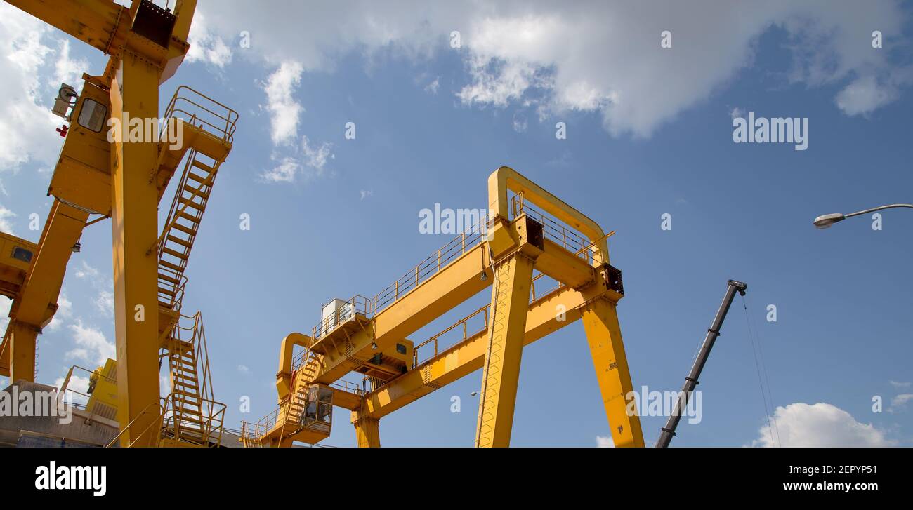Yellow Gantry Bridge Crane for Cargo and Construction Stock Photo - Alamy