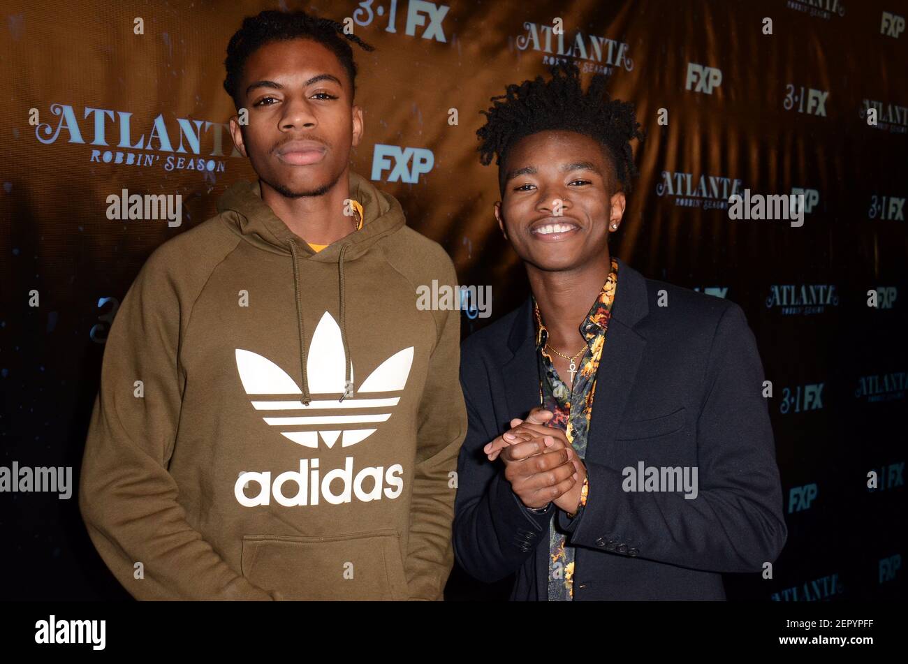 ATLANTA, GA - FEBRUARY 26: Frederick Williams and Jasun Jabbar attend a ...