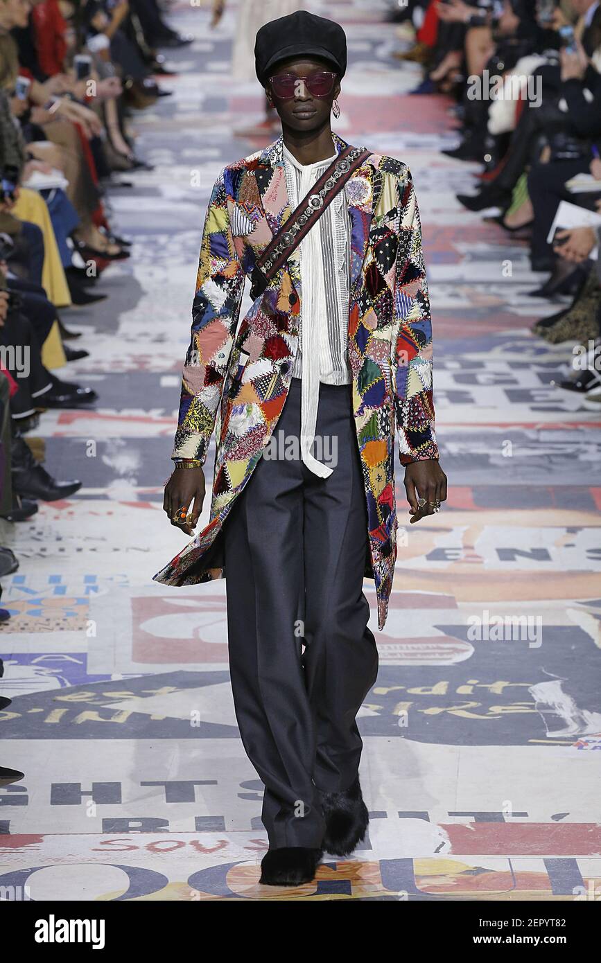 Model Fatou Jobe walks on the runway during the Christian Dior Fashion ...