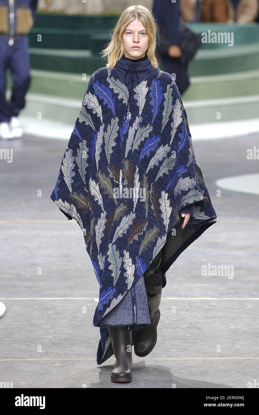 Model Line Kjaergaard walks on the runway during the Lacoste Fashion ...