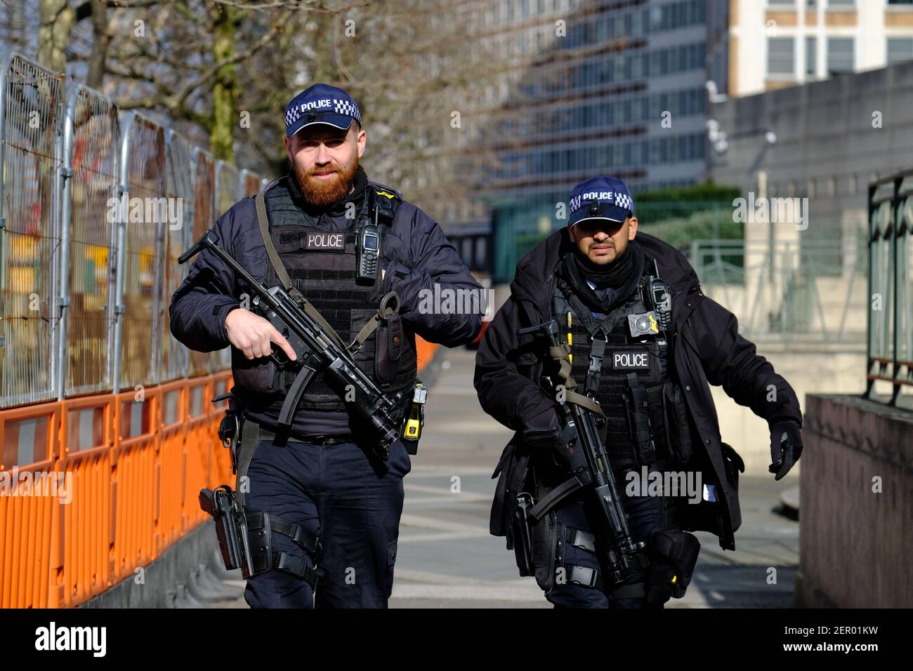 Authorised Firearms Officers with the Metropolitan Police patrol the ...