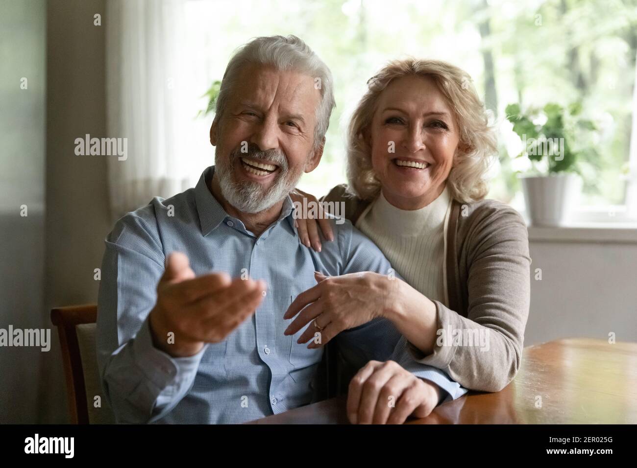 Happy middle aged couple laughing hi-res stock photography and images ...