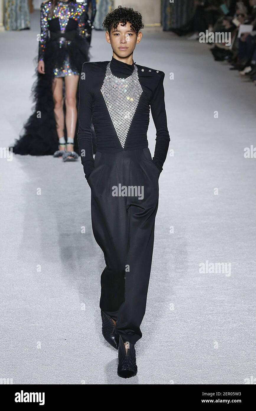 Model Dilone walks on the runway during the Balmain Fashion Show during ...
