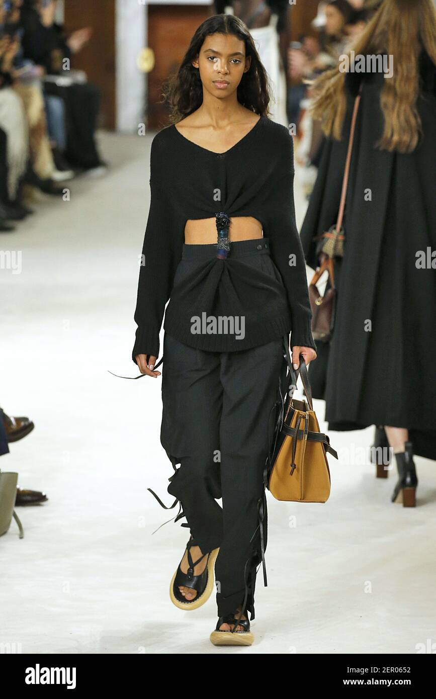 Model Alyssa Traore walks on the runway during the Loewe Fashion Show ...