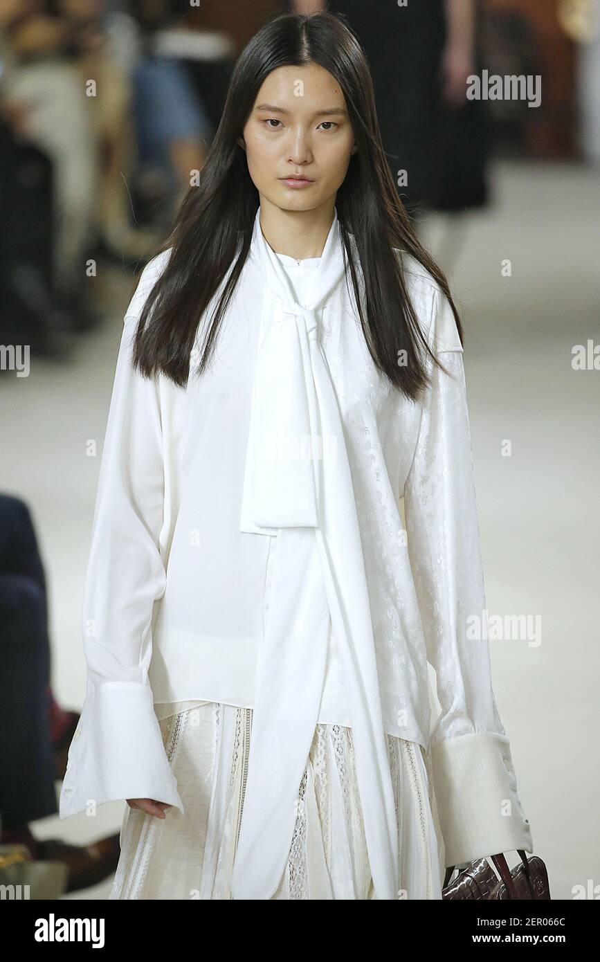Model Liu Chunjie walks on the runway during the Loewe Fashion Show ...