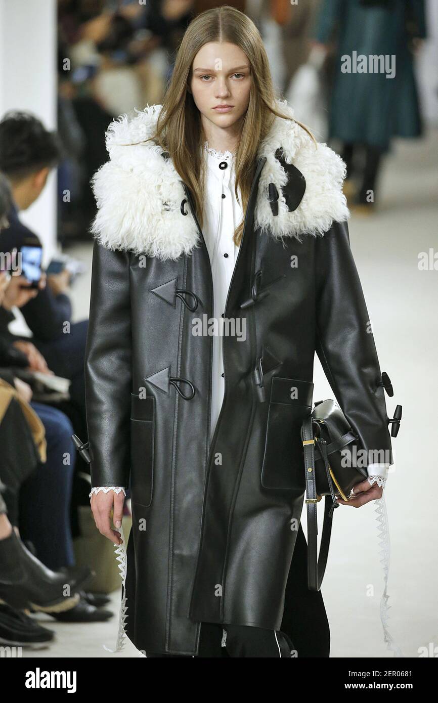 Model Natalie Ogg walks on the runway during the Loewe Fashion Show ...