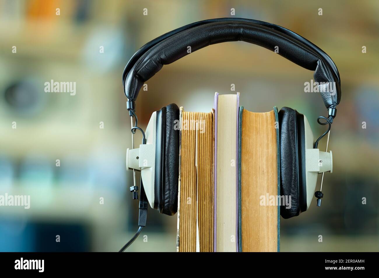 audio book concept with books and vintage headphones,literature ...