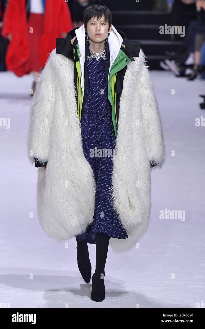 Model Kennah Lau walks on the runway during the Balenciaga Fashion Show ...