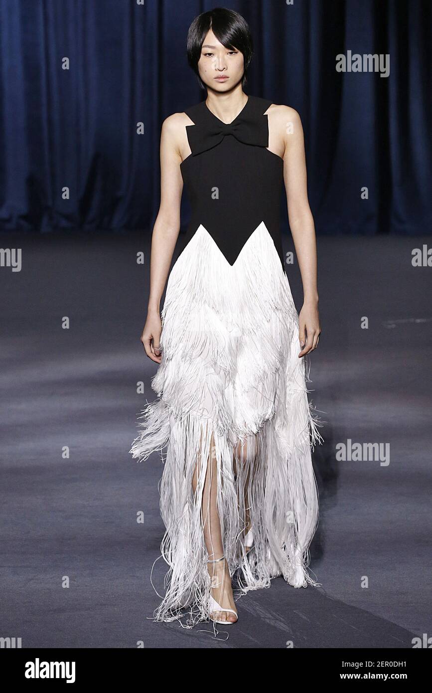 Model Chu Wong walks on the runway during the Givenchy Fashion Show ...