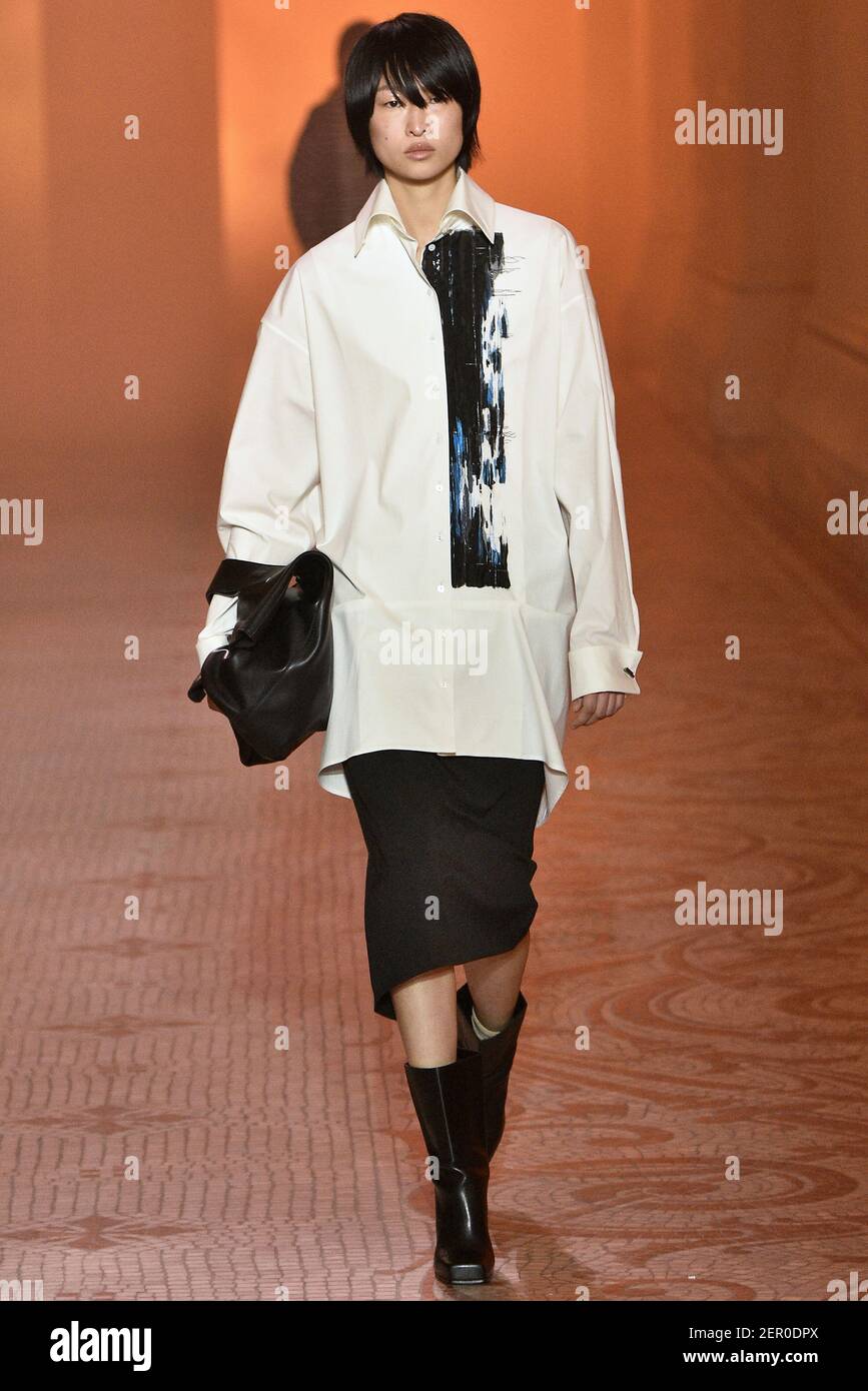 Model Chu Wong walks on the runway during the Poiret Fashion Show ...