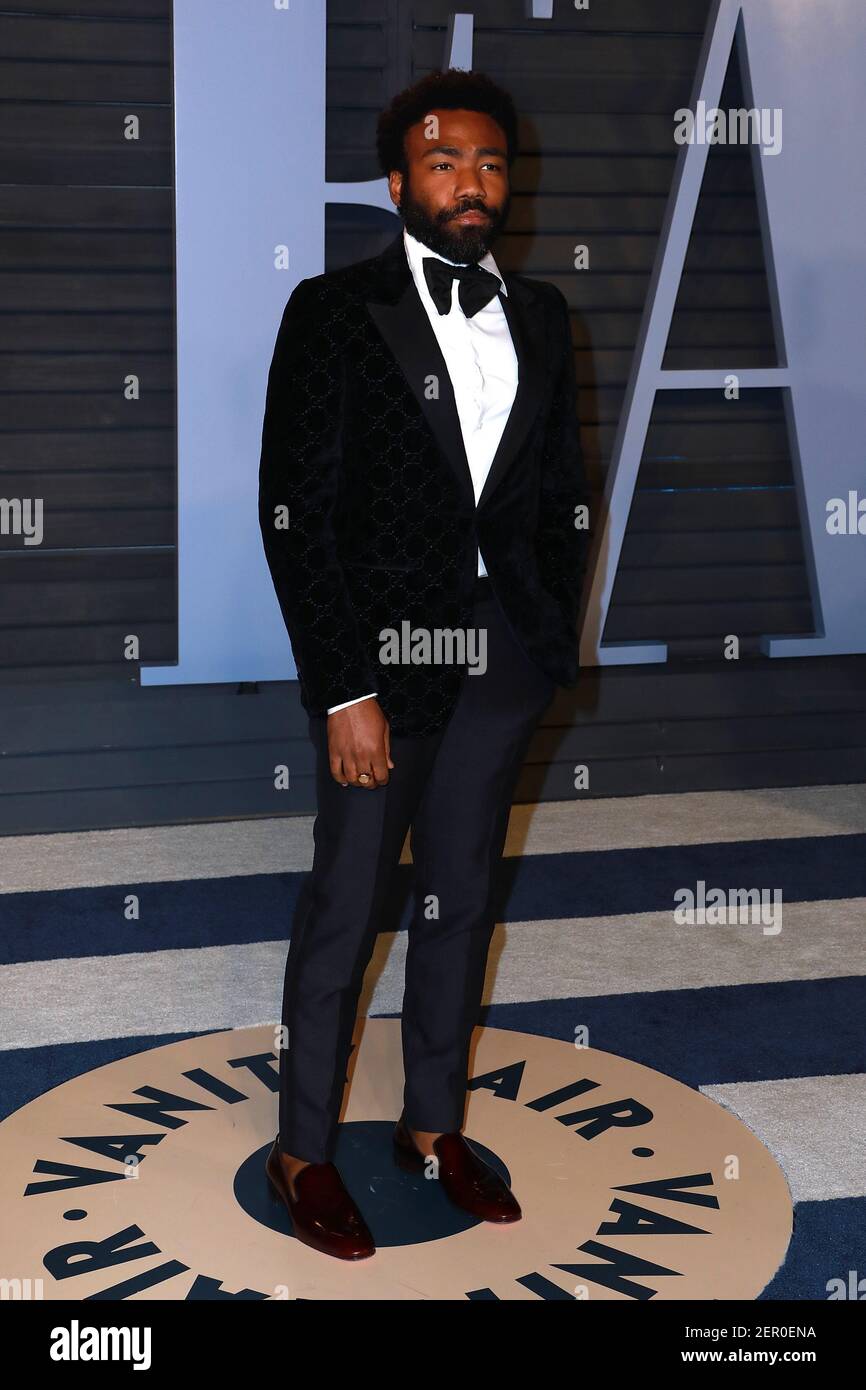 Donald Glover walking on the red carpet at the 2018 Vanity Fair Oscar ...