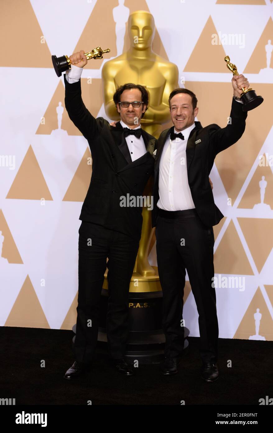 Dan Cogen and Bryan Fogel posing in the Press Room during the 90th ...