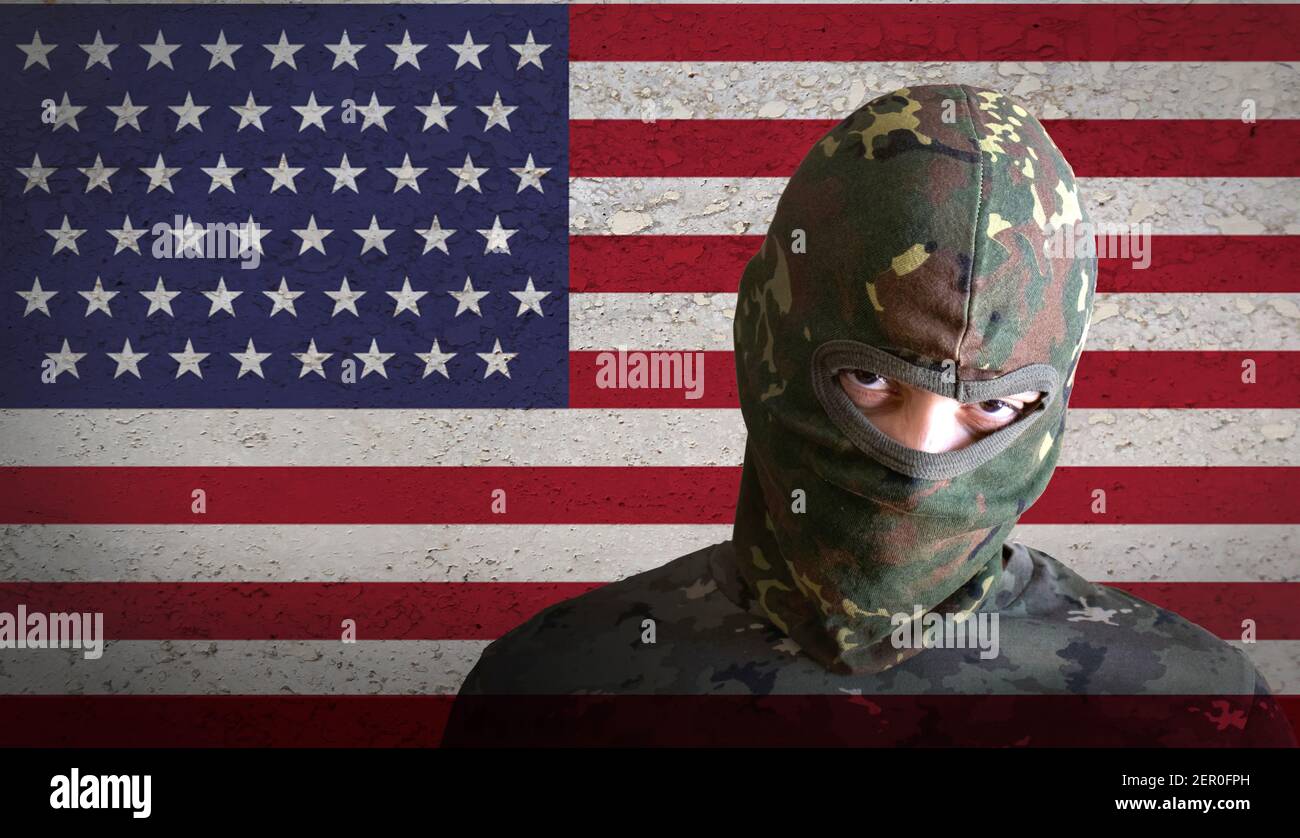 American angry soldier with usa flag behind. Military man with ...