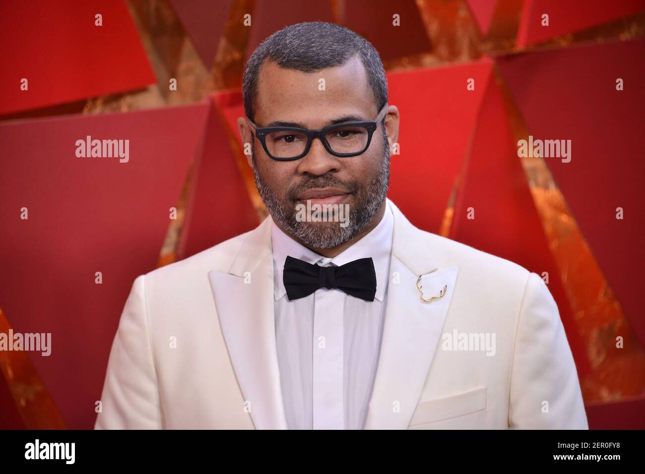 Jordan Peele walking on the red carpet during the 90th Academy Awards ...