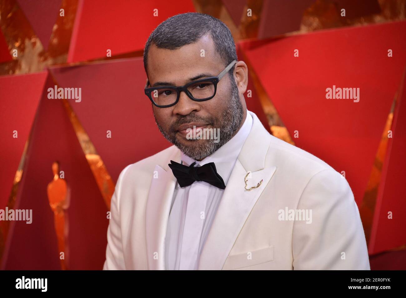 Jordan Peele walking on the red carpet during the 90th Academy Awards ...