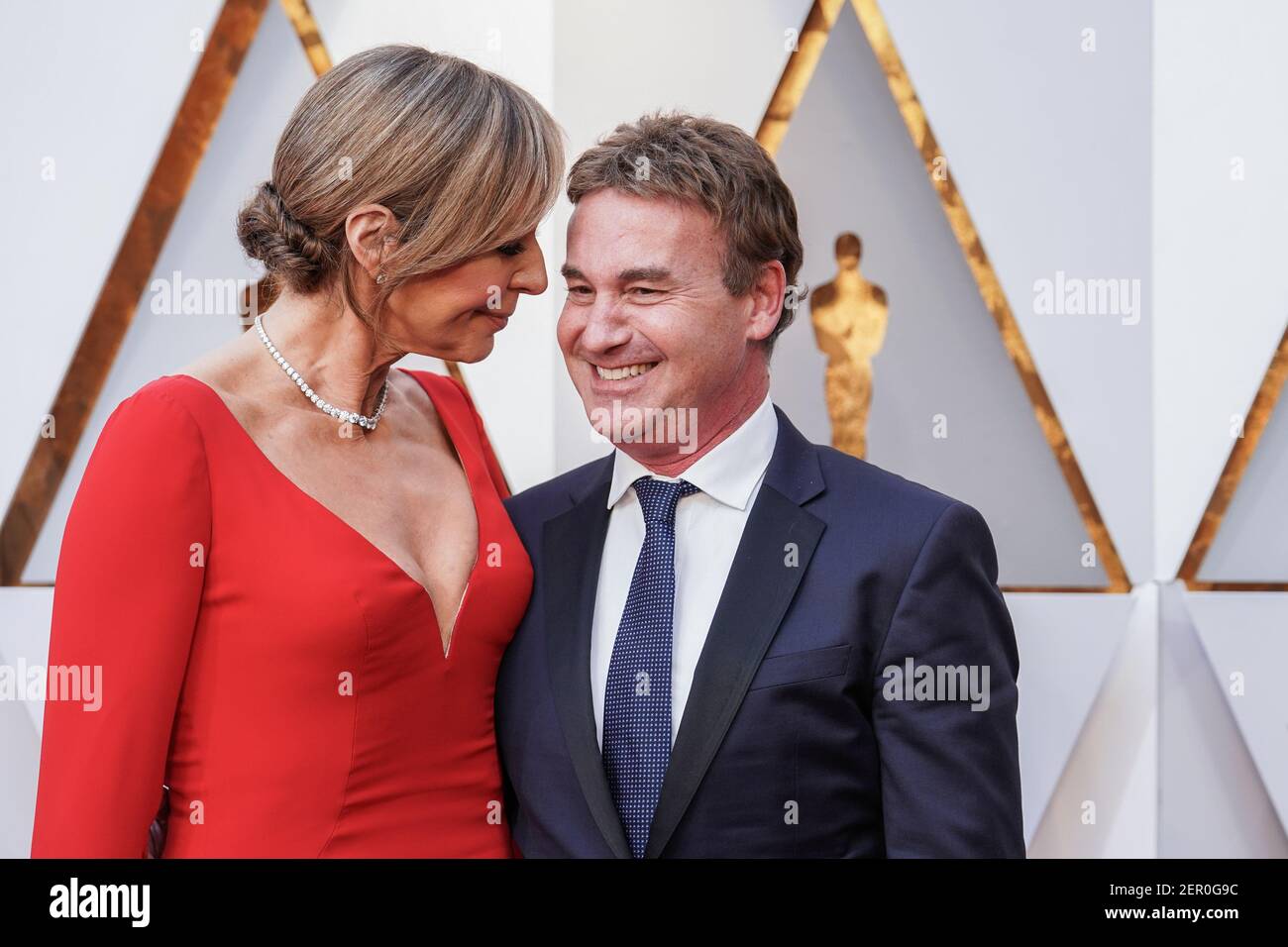 Allison Janney and Richard Jenik walking on the red carpet during the ...