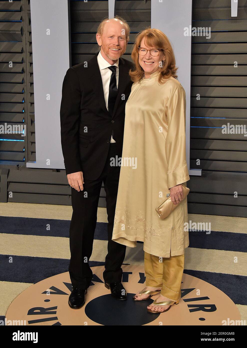 BEVERLY HILLS, CA - MARCH 4: Ron Howard (L) and Cheryl Howard arrive at ...