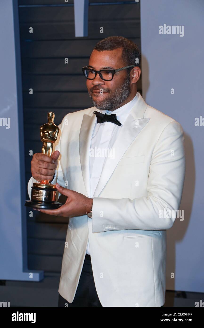 Jordan Peele walking on the red carpet at the 2018 Vanity Fair Oscar ...
