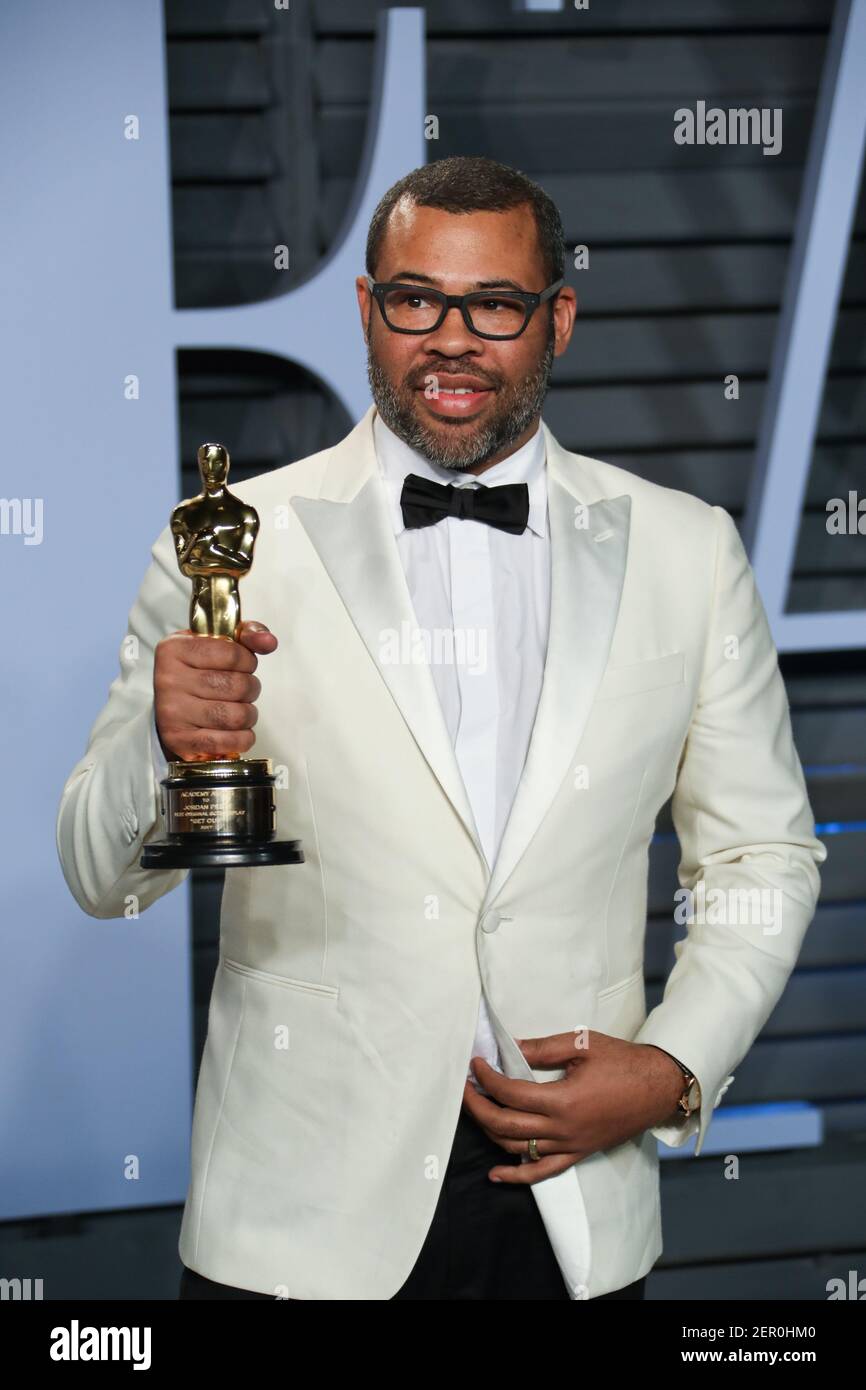 Jordan Peele walking on the red carpet at the 2018 Vanity Fair Oscar ...