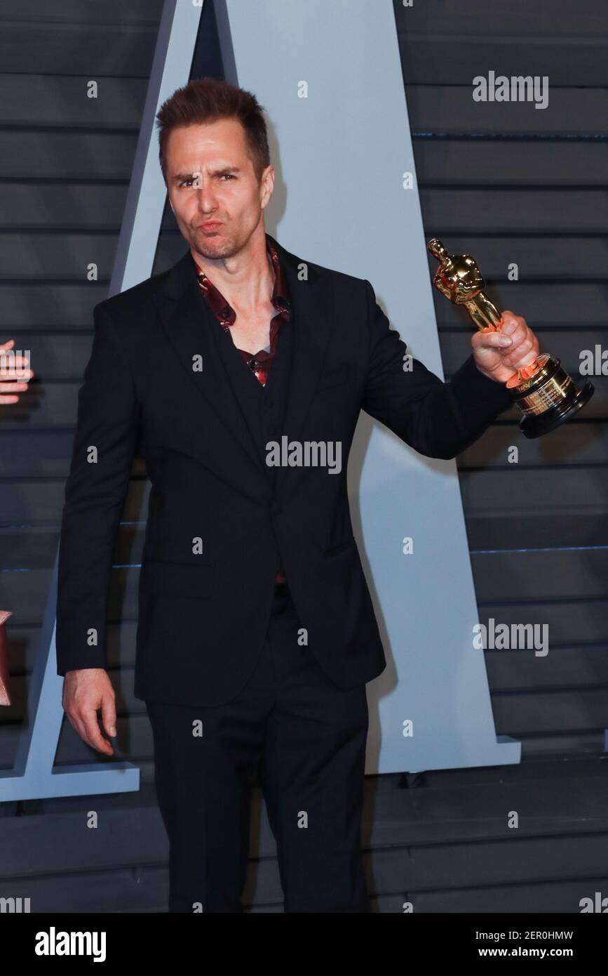 Sam Rockwell walking on the red carpet at the 2018 Vanity Fair Oscar ...