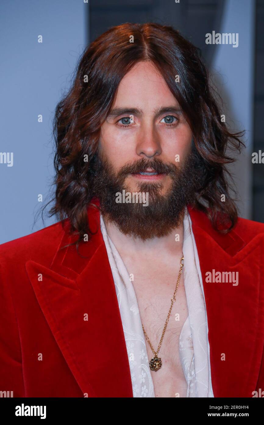 Jared Leto walking on the red carpet at the 2018 Vanity Fair Oscar ...