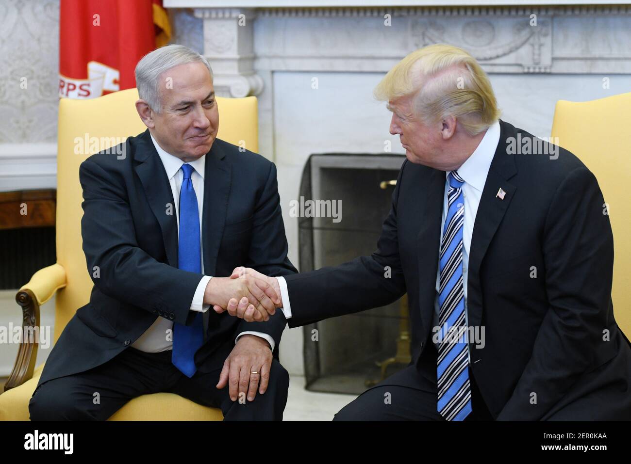 US President Donald Trump checks hands with Prime Minister Benjamin ...