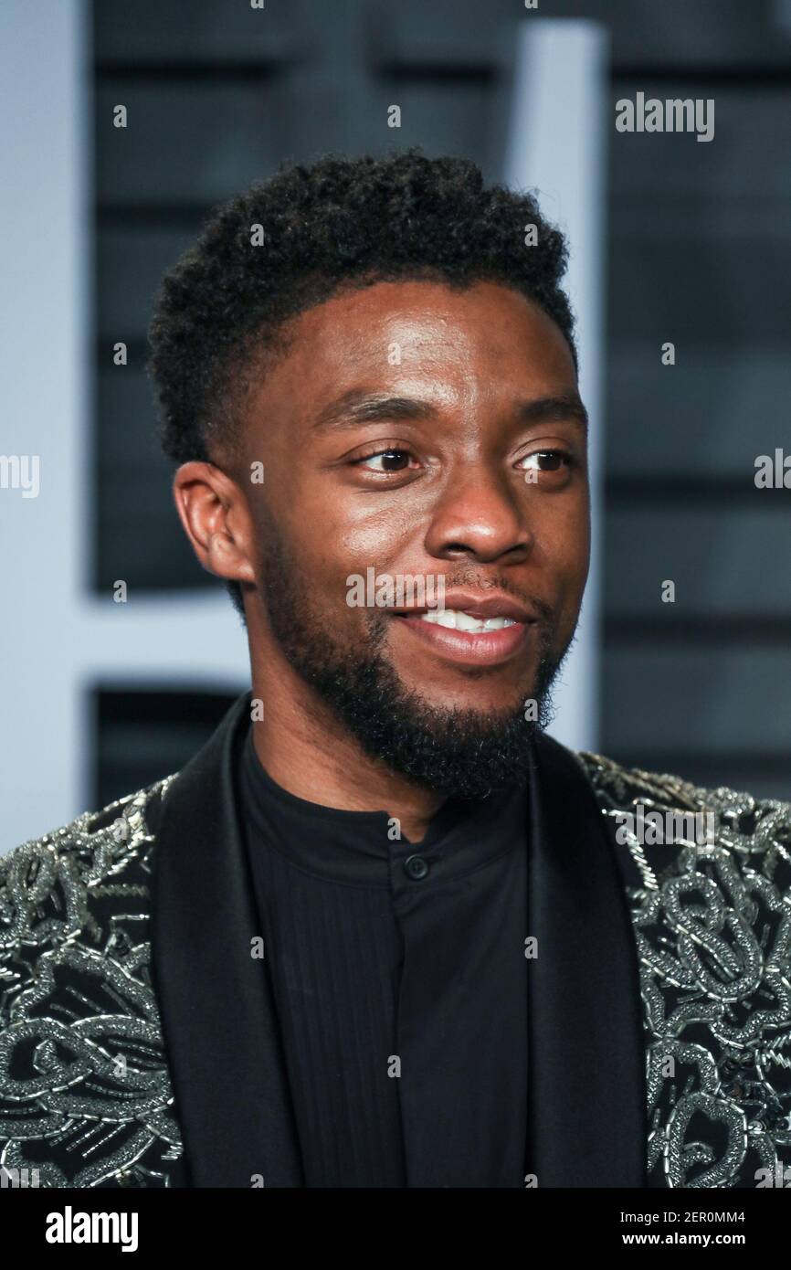 Chadwick Boseman walking on the red carpet at the 2018 Vanity Fair ...