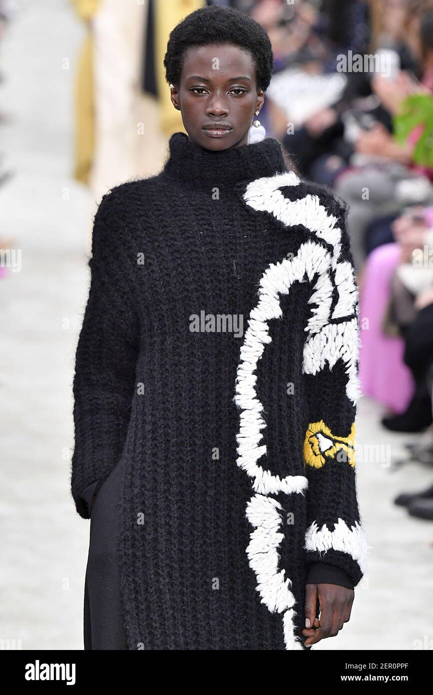 Model Fatou Jobe walks on the runway during the Valentino Fashion Show ...