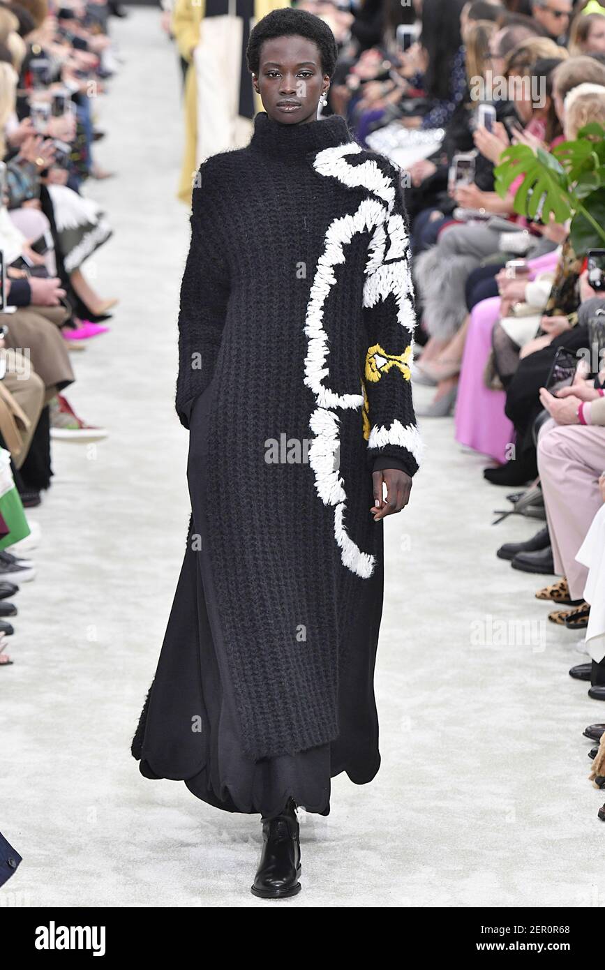 Model Fatou Jobe walks on the runway during the Valentino Fashion Show ...