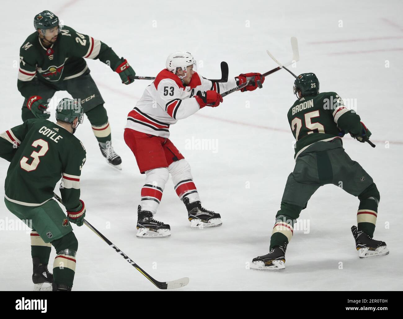 Minnesota Wild defenseman Jonas Brodin (25) poke checks the puck away ...