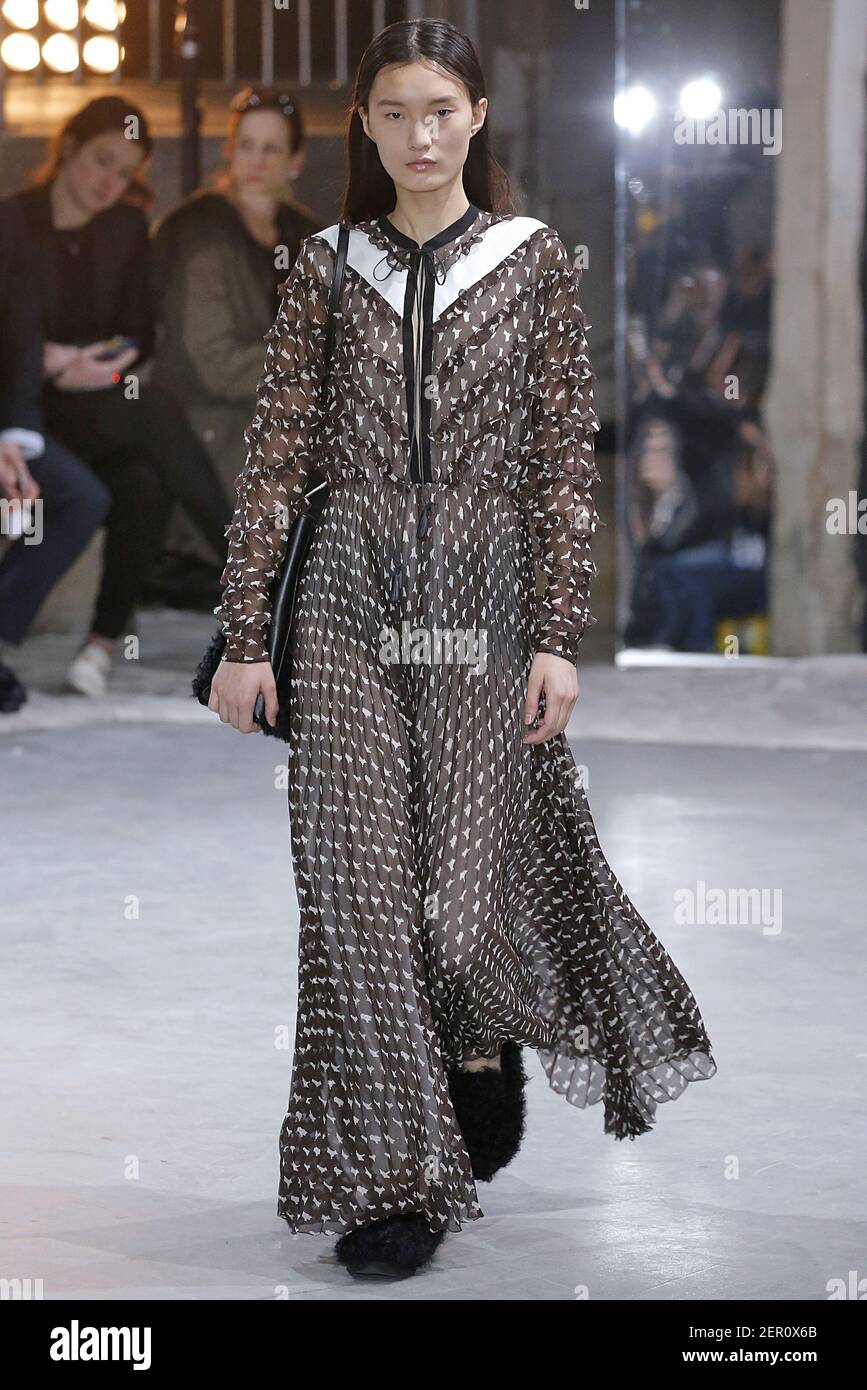 Model Liu Chunjie walks on the runway during the Giambattista Valli ...