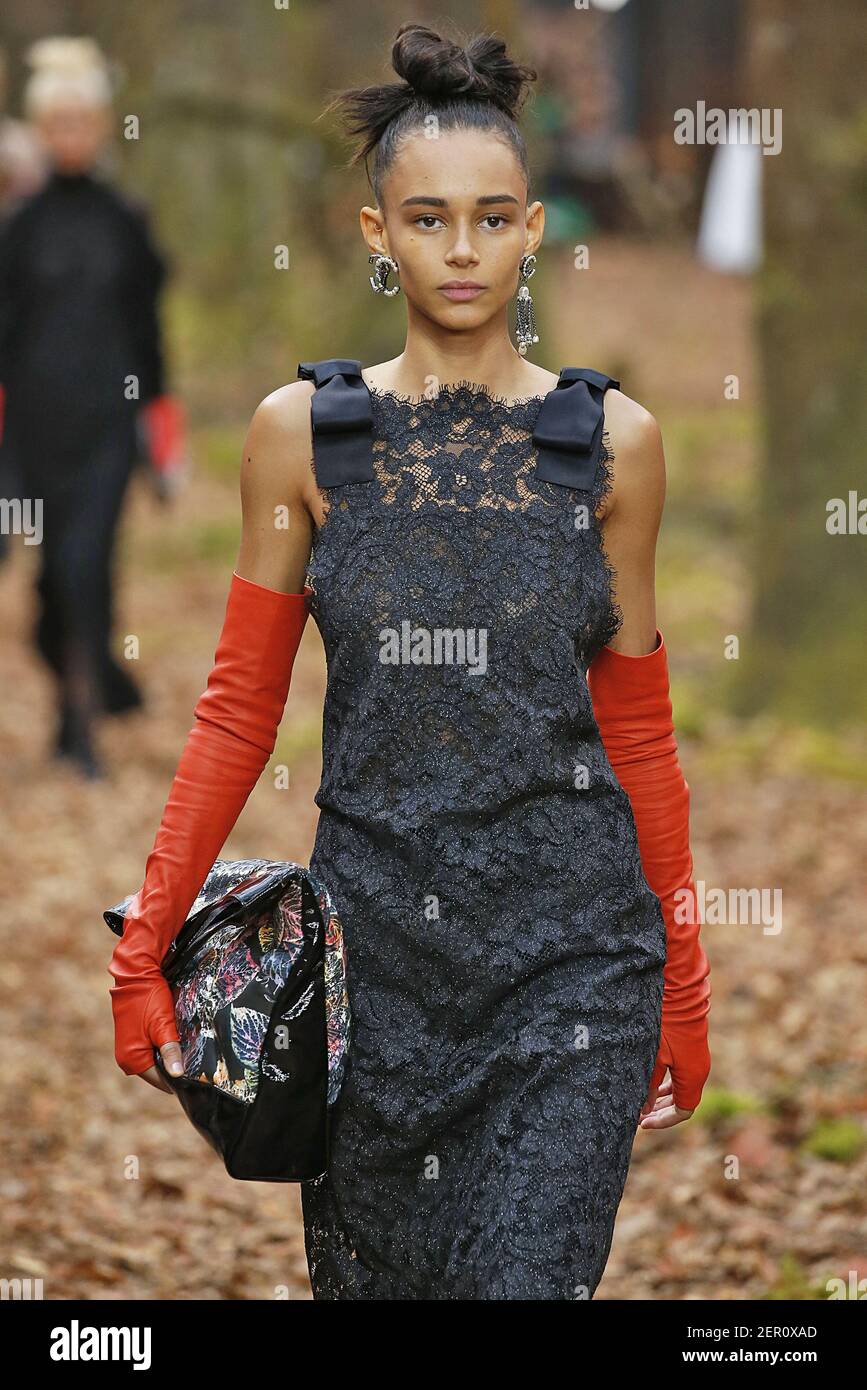 Model Binx Walton walks on the runway during the Chanel Fashion Show ...