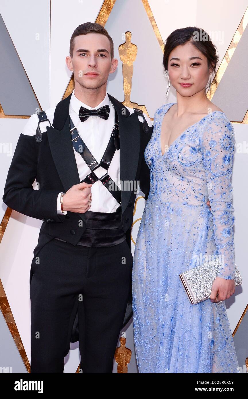 Adam Rippon (Wearing Moschino) and Mirai Nagasu walking on the red ...