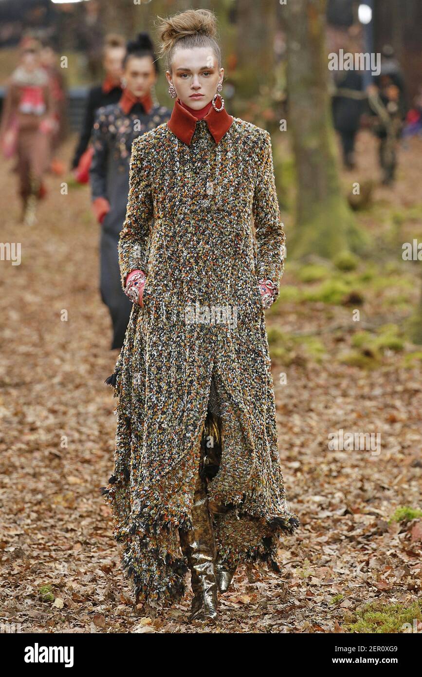 Model Natalie Ogg walks on the runway during the Chanel Fashion Show ...