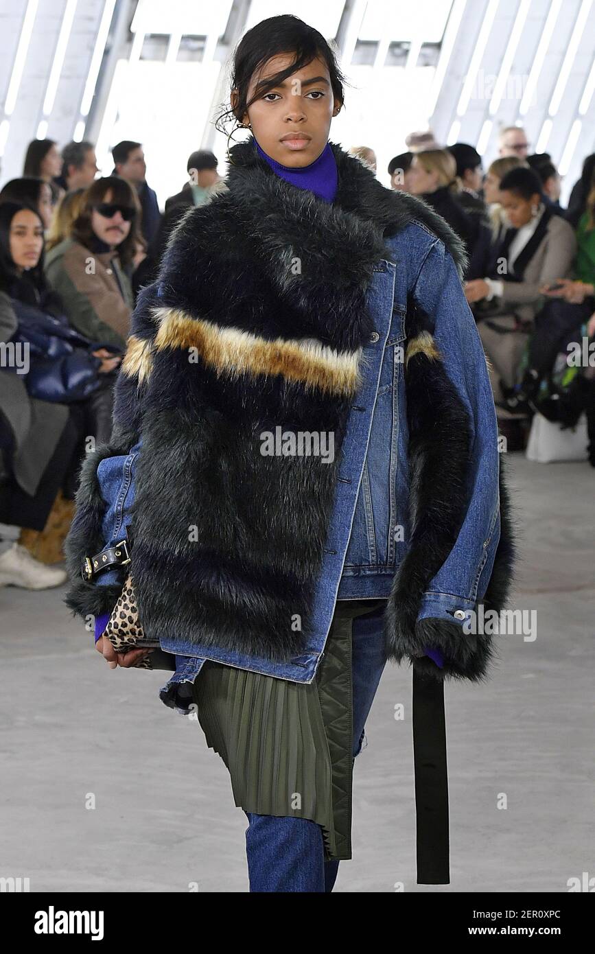 Model Alyssa Traore walks on the runway during the Sacai Fashion Show ...