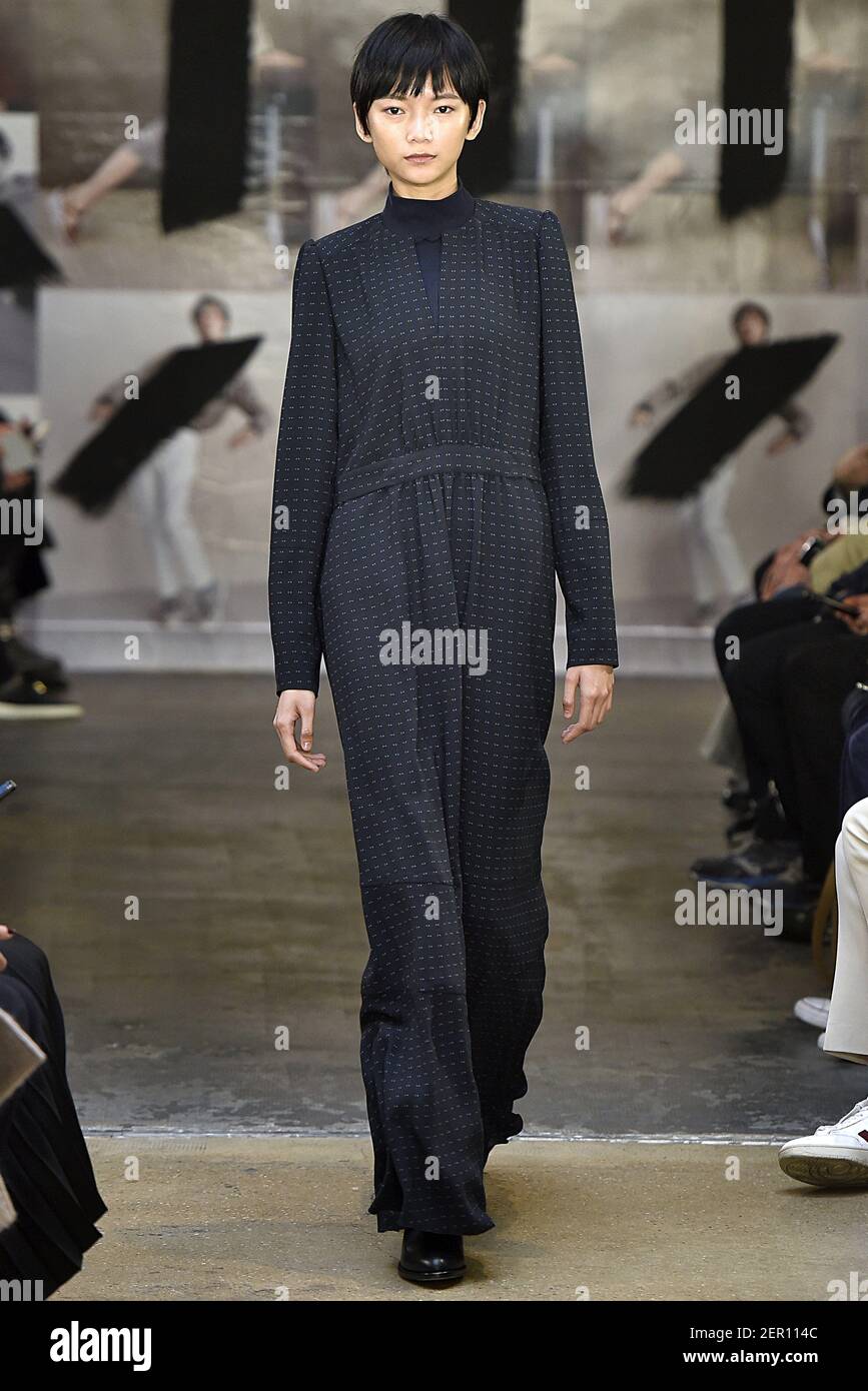Model Shiyi Lin walks on the runway during the APC Fashion Show during ...