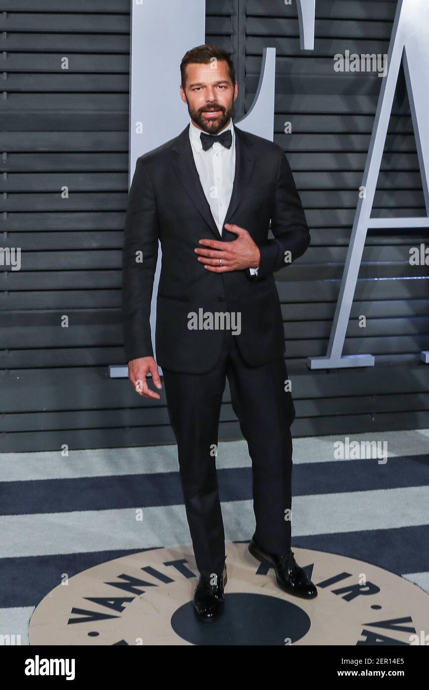 Ricky Martin walking on the red carpet at the 2018 Vanity Fair Oscar ...