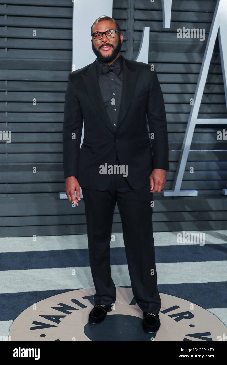Tyler Perry walking on the red carpet at the 2018 Vanity Fair Oscar ...