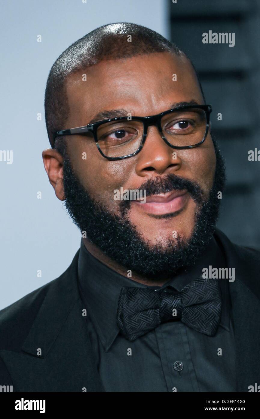 Tyler Perry walking on the red carpet at the 2018 Vanity Fair Oscar ...