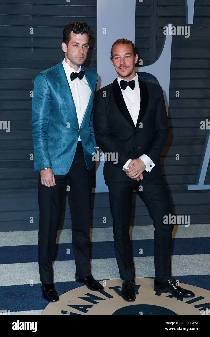 Mark Ronson and Diplo walking on the red carpet at the 2018 Vanity Fair ...