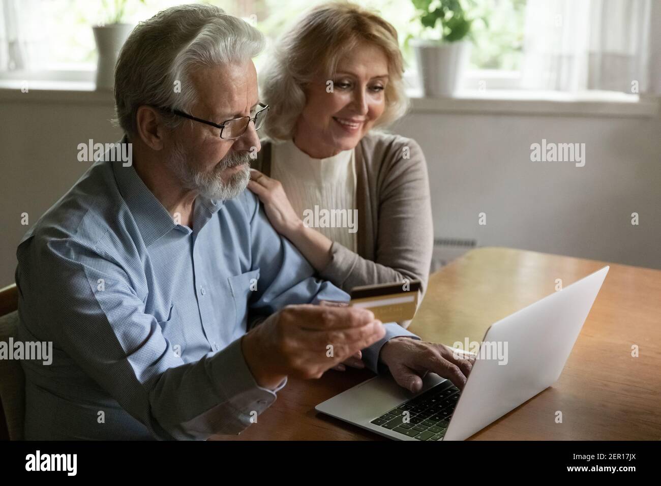 Old man booking hi-res stock photography and images - Alamy