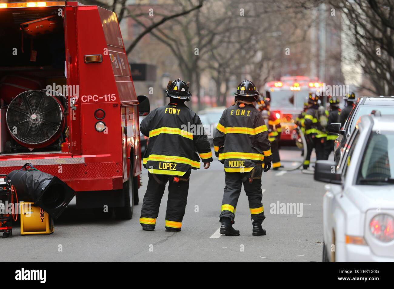 First responders and crowds gather at a manhole explosion in midtown ...