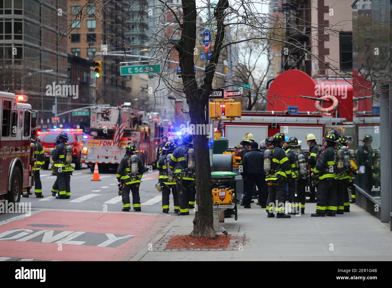 First responders and crowds gather at a manhole explosion in midtown ...